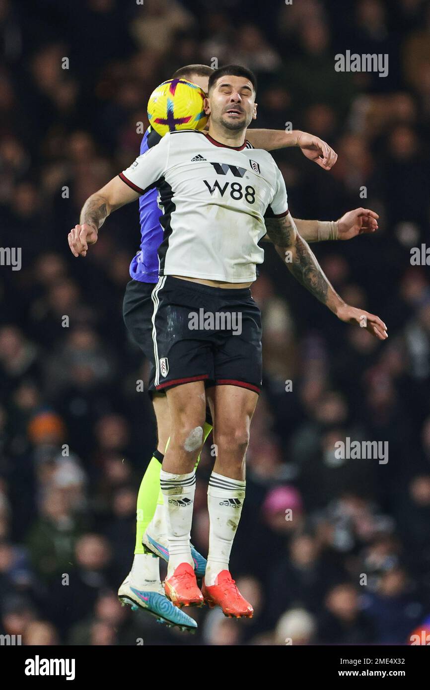 Aleksandar Mitrović #9 of Fulham and Eric Dier #15 of Tottenham Hotspur ...