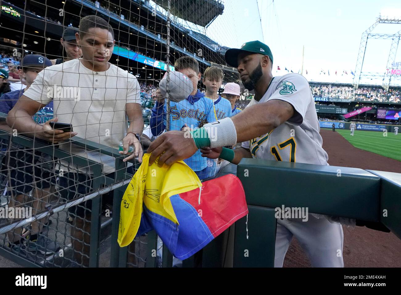 Oakland Athletics shortstop Elvis Andrus, who is from Venezuela, signs ...
