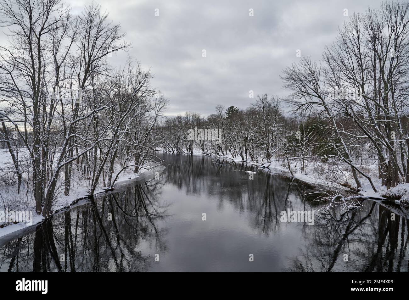 Winter reflections on the Dead River, Leeds Maine Stock Photo - Alamy