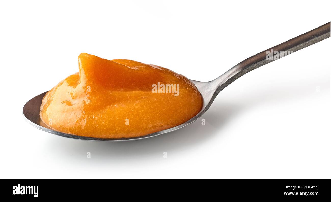 vegetable puree in spoon isolated on white background Stock Photo - Alamy