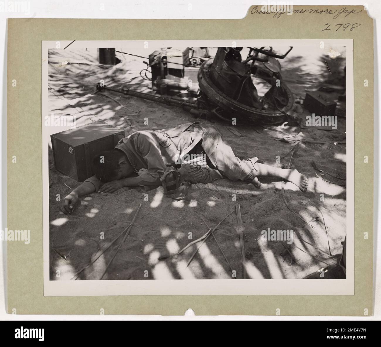 A Coast Guard combat photographer captures the body of a fallen ...