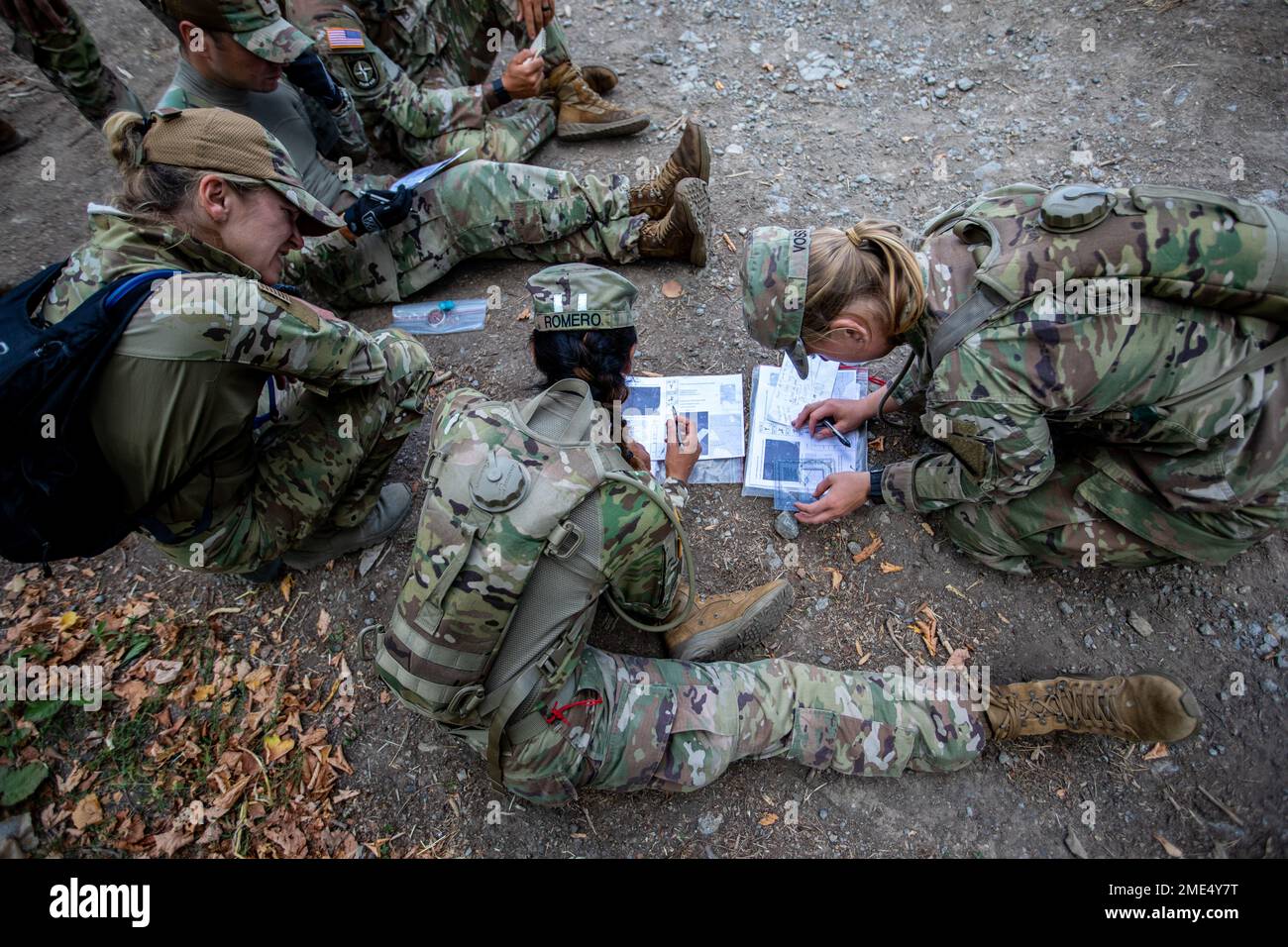 CIOR competitors plan their routes before attacking an Orienteering ...