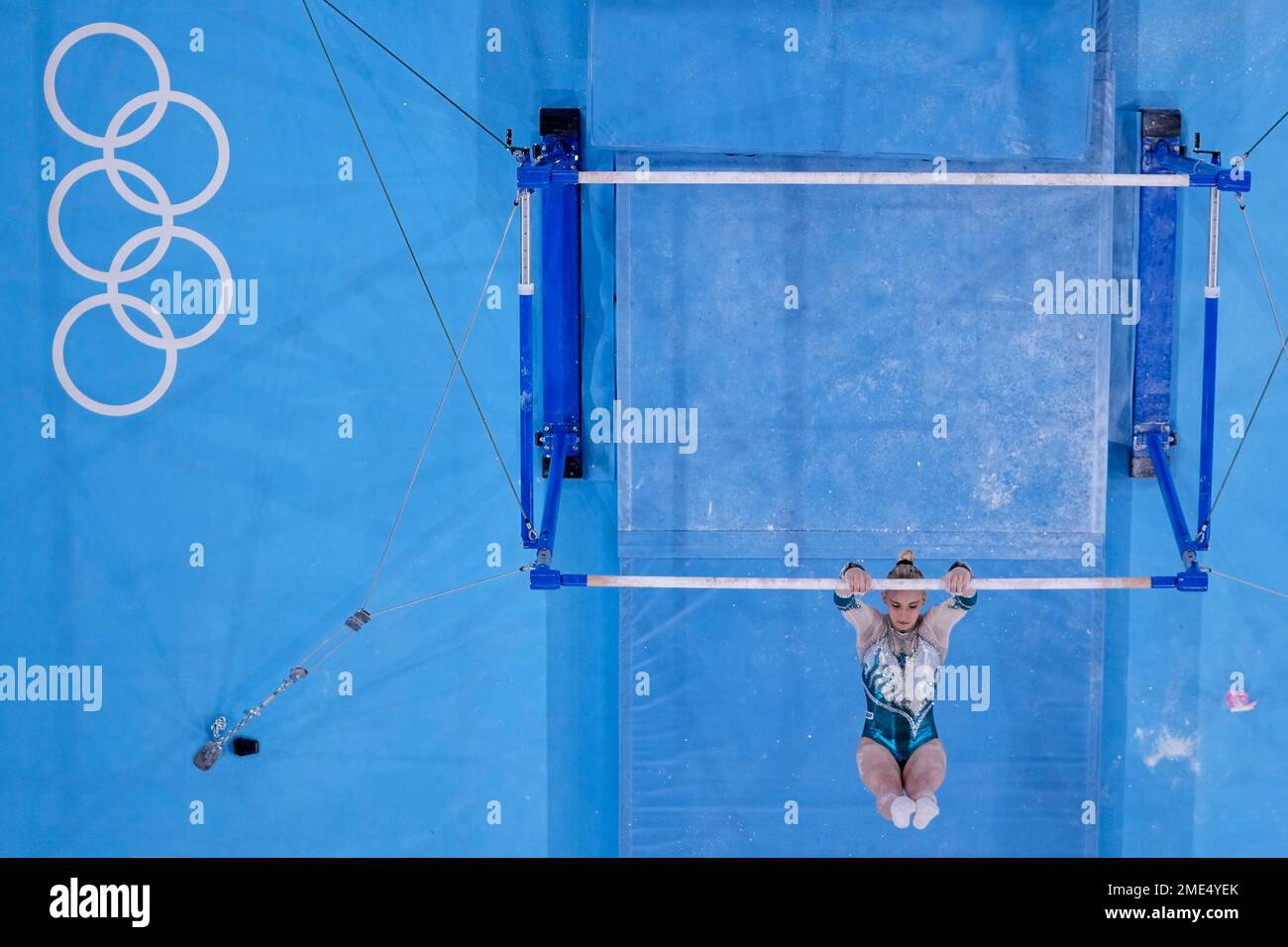 Alice D'Amato, of Italy, performs on the uneven bars during women's ...