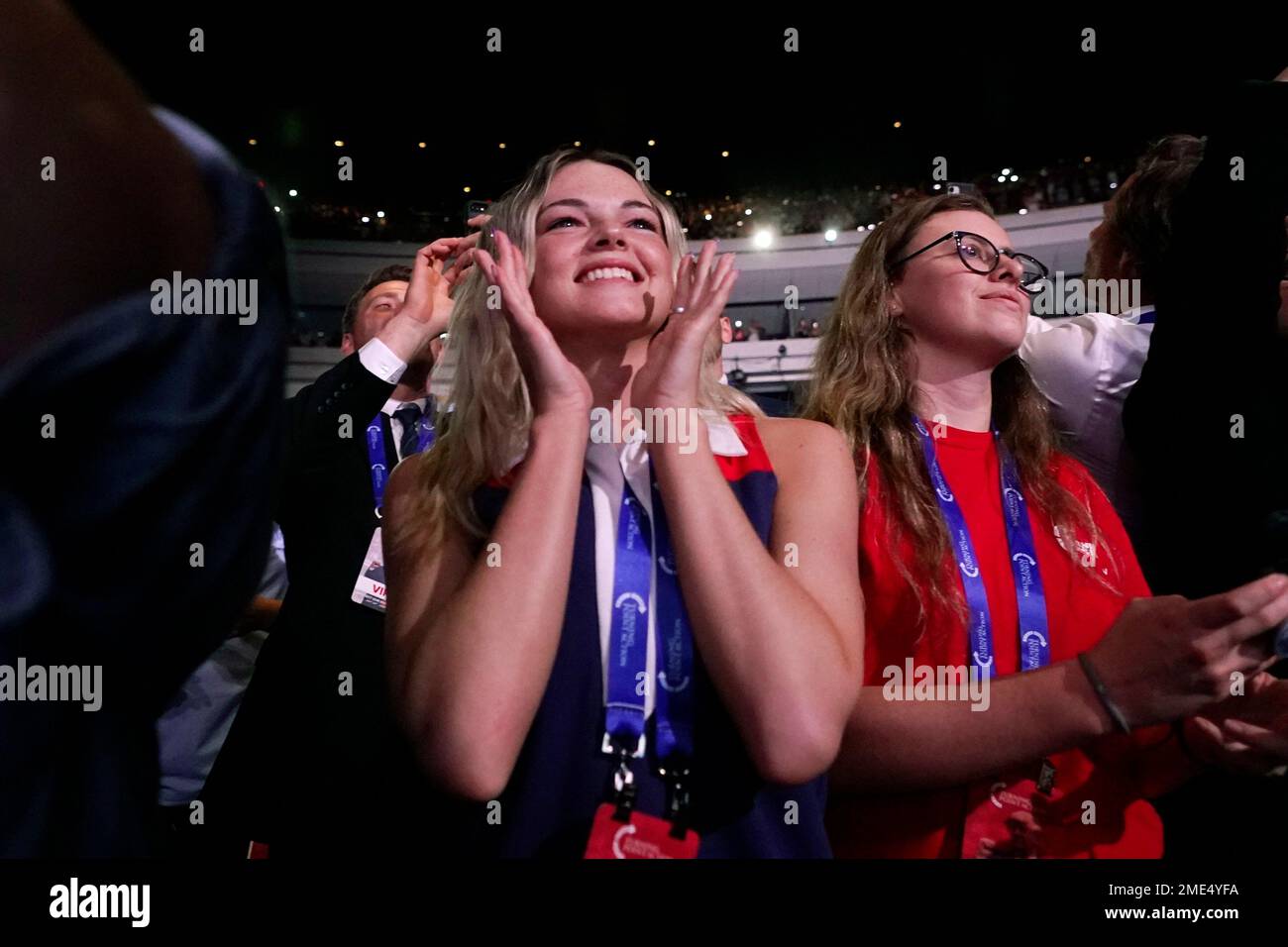 Supporters of former President Donald Trump cheer as he arrives on ...