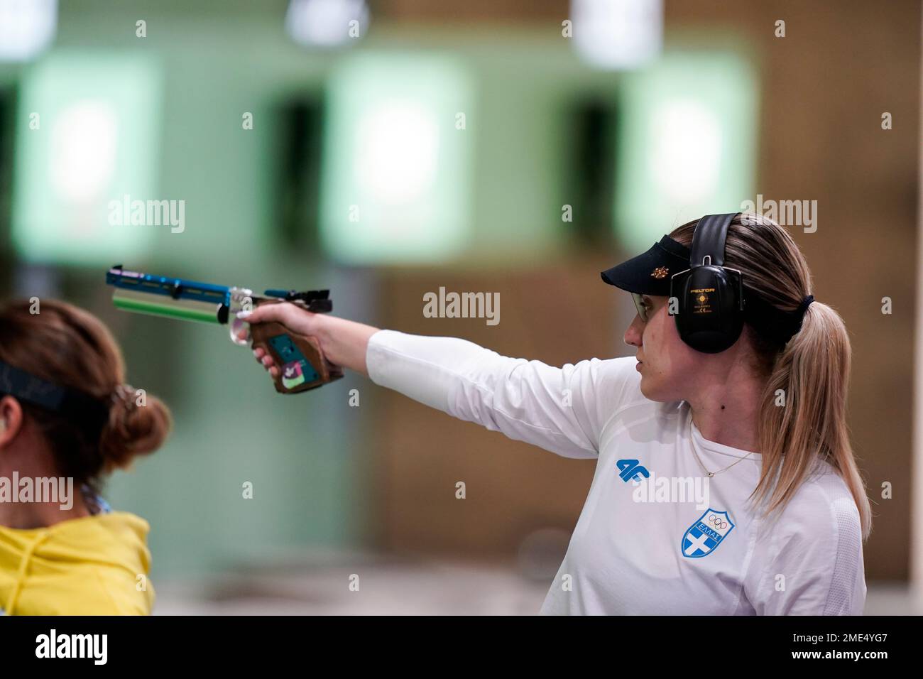Anna Korakaki, of Greece, competes in the women's 10-meter air pistol ...
