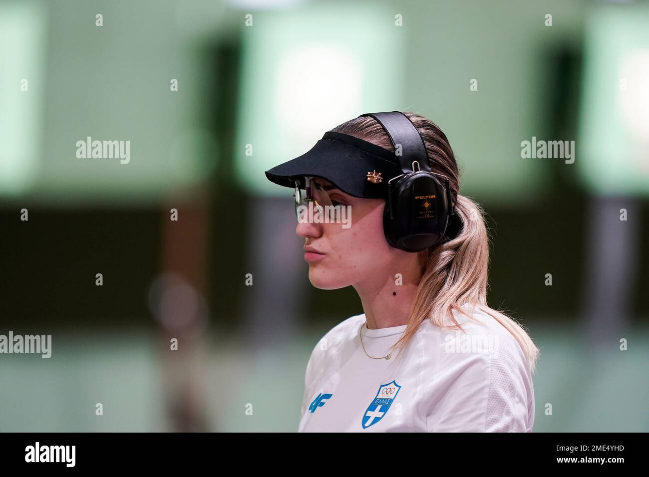 Anna Korakaki, of Greece, competes in the women's 10-meter air pistol ...