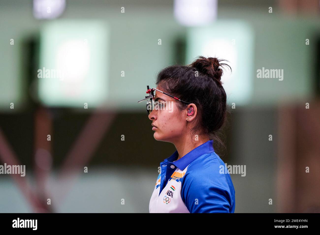 Manu Bhaker, of India, competes in the women's 10-meter air pistol at ...