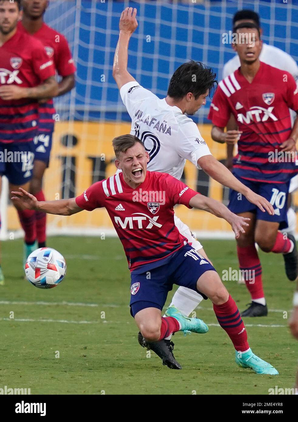 FC Dallas forward Szabolcs Schon (11) stumbles next to LA Galaxy ...