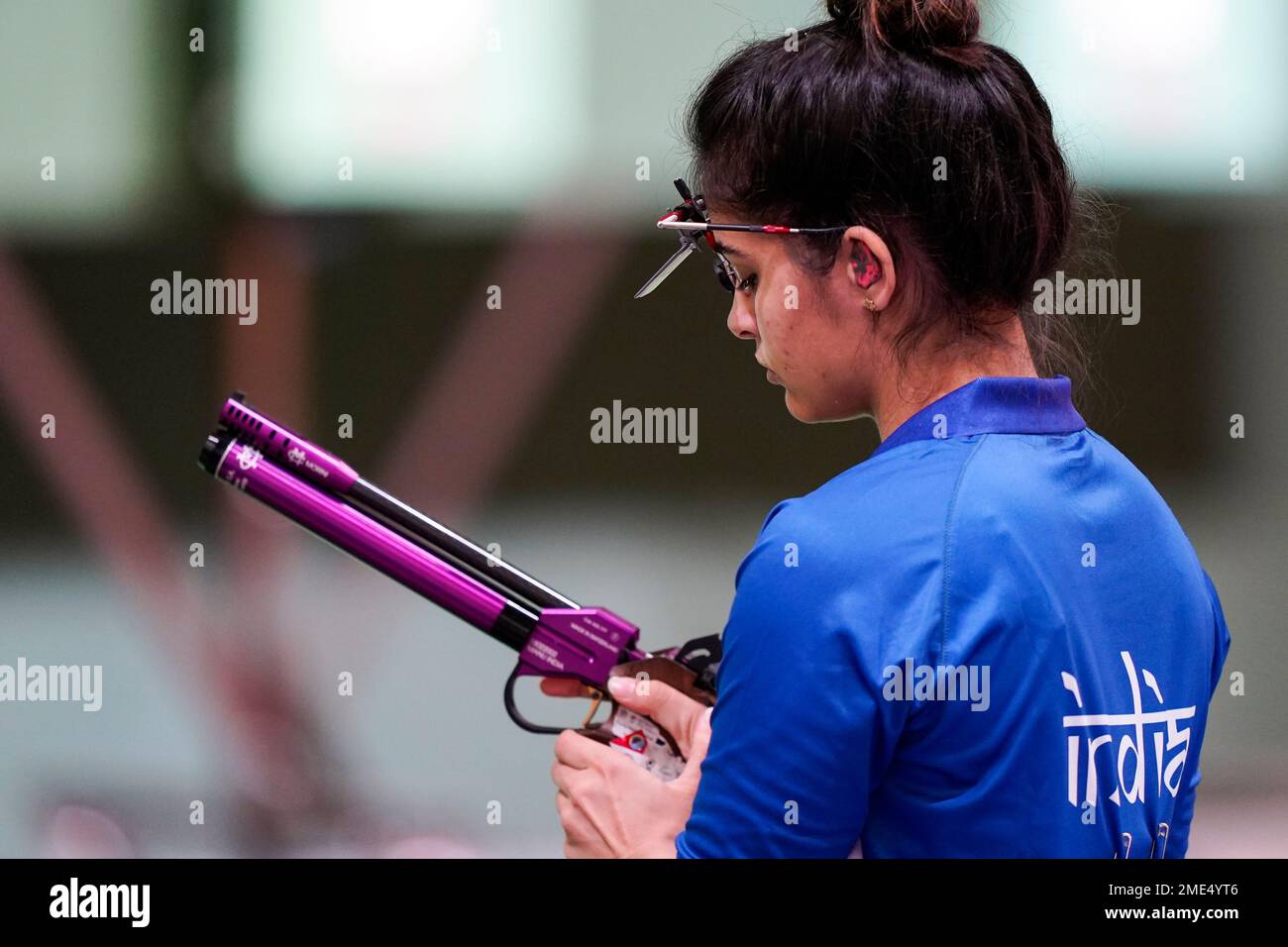 Manu Bhaker, of India, competes in the women's 10-meter air pistol at ...