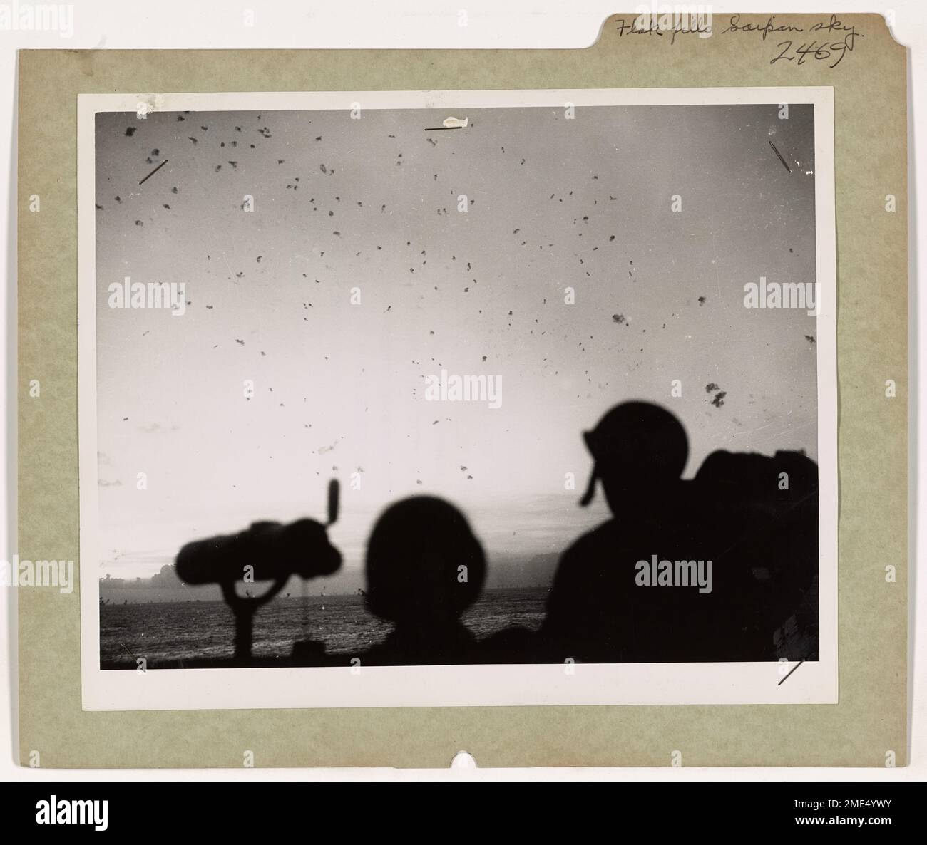 Flak Fills the Sky as Yankee Planes Attack Saipan. From a Coast Guard ...