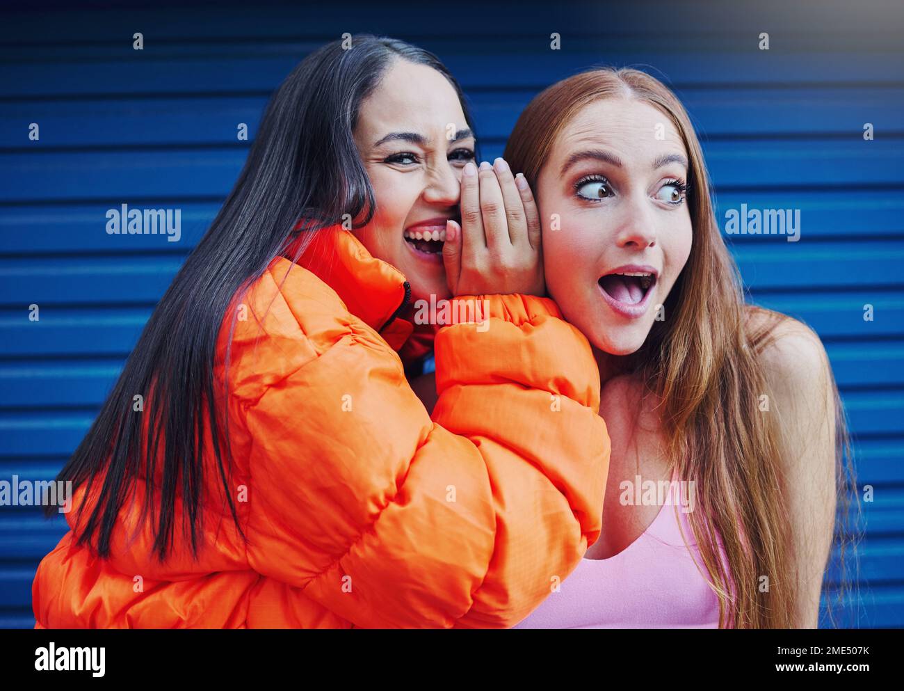 Friends, gossip in ear and women in laughing at secret joke in city ...