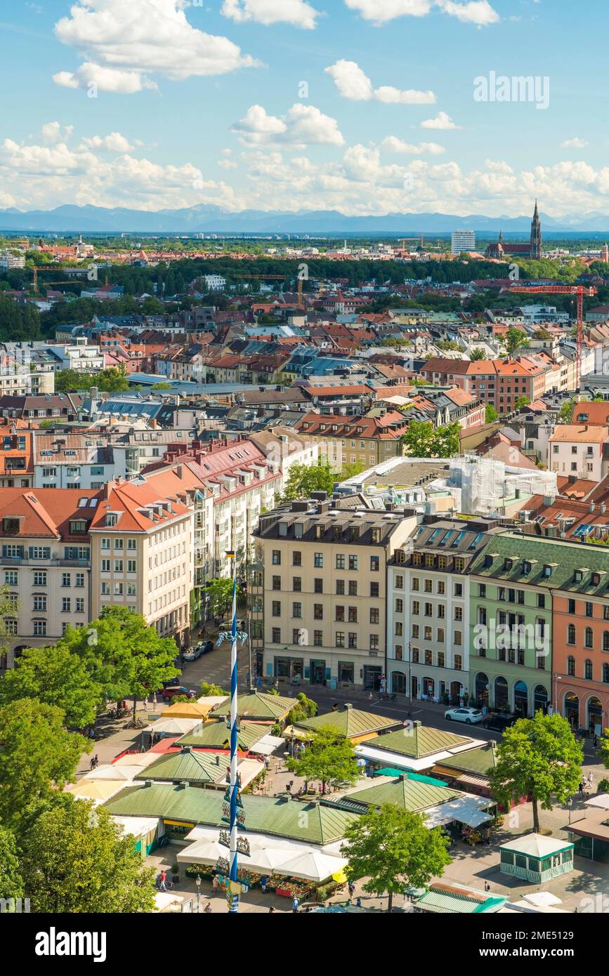 Germany, Munich, Victuals Market with apartment buildings in background ...