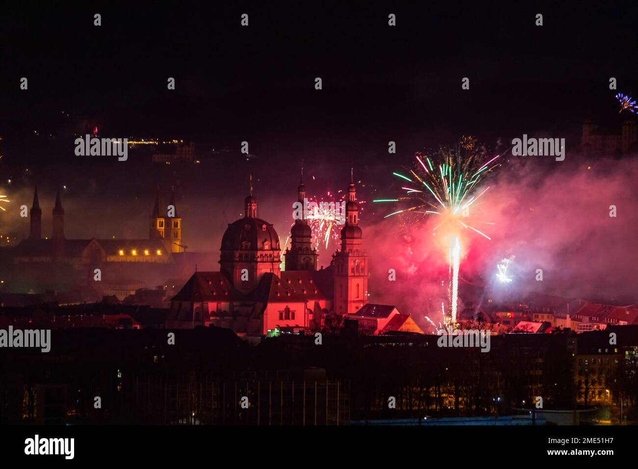 Germany, Bavaria, Wurzburg, New Years Eve fireworks exploding over Haug ...