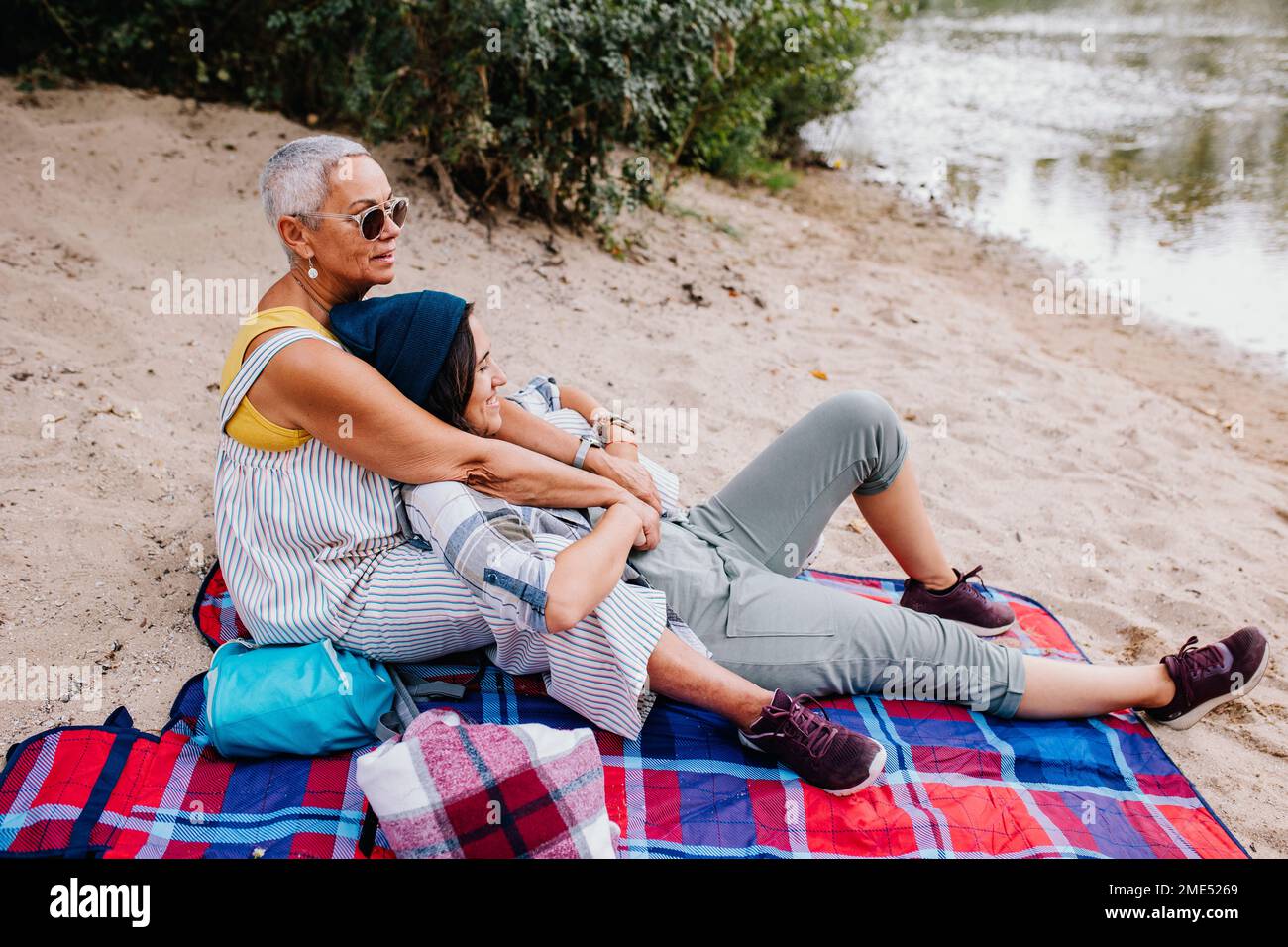 Friendship in the sand hi-res stock photography and images - Alamy