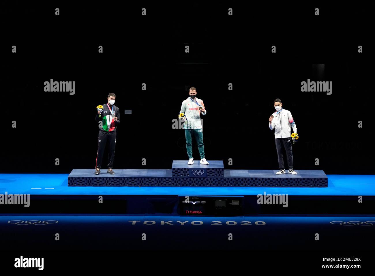 From left, silver medalist Luigi Samele of Italy, gold medalist Aron ...