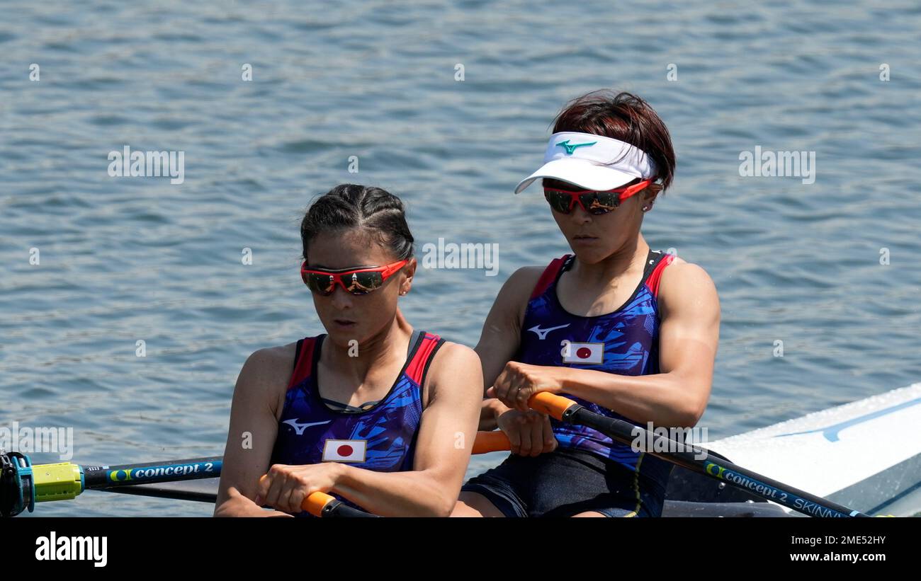 Chiaki Tomita and Ayami Oishi, of Japan, compete in the lightweight ...