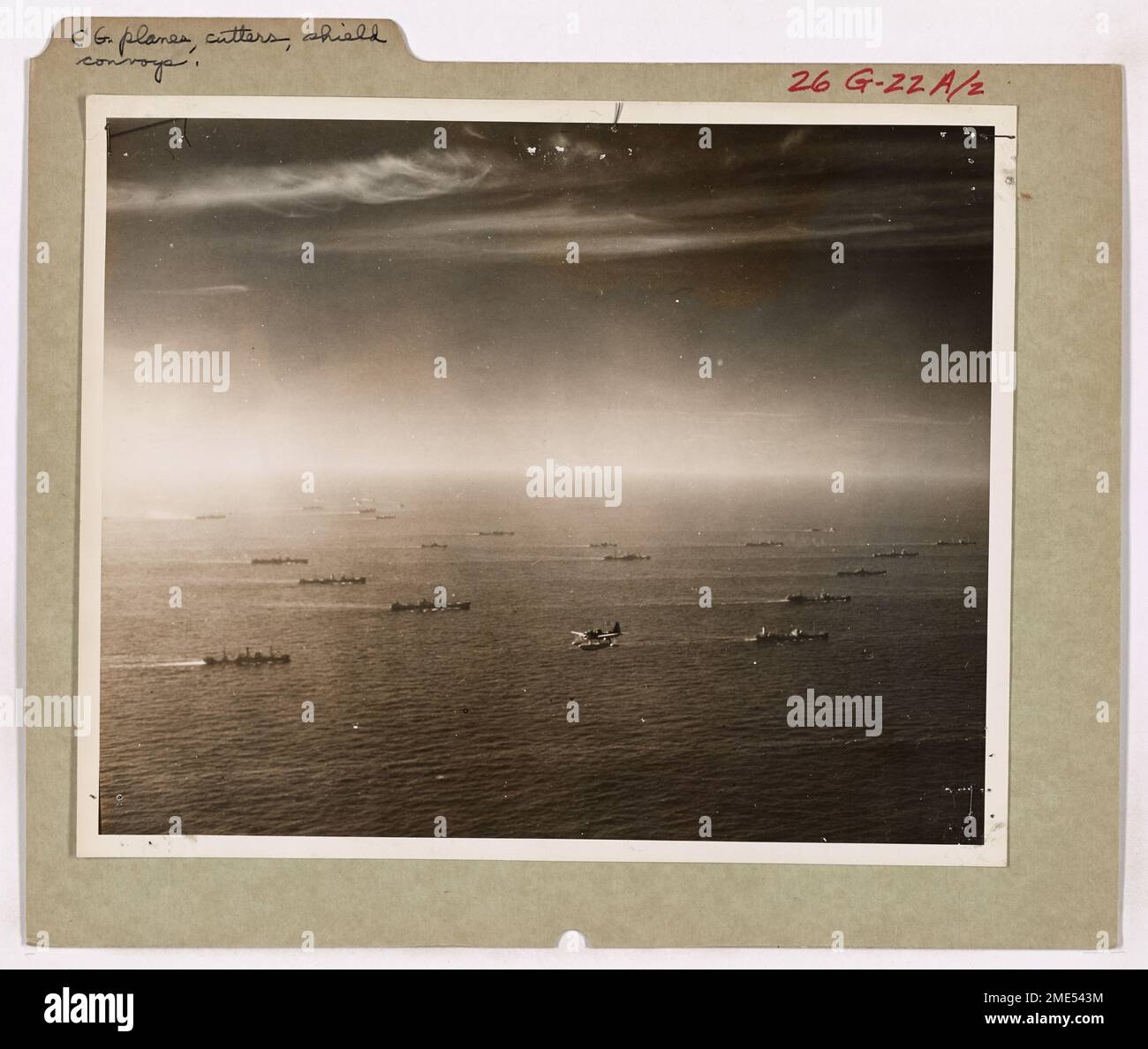 This image depicts Coast Guard planes and cutters working together to ...