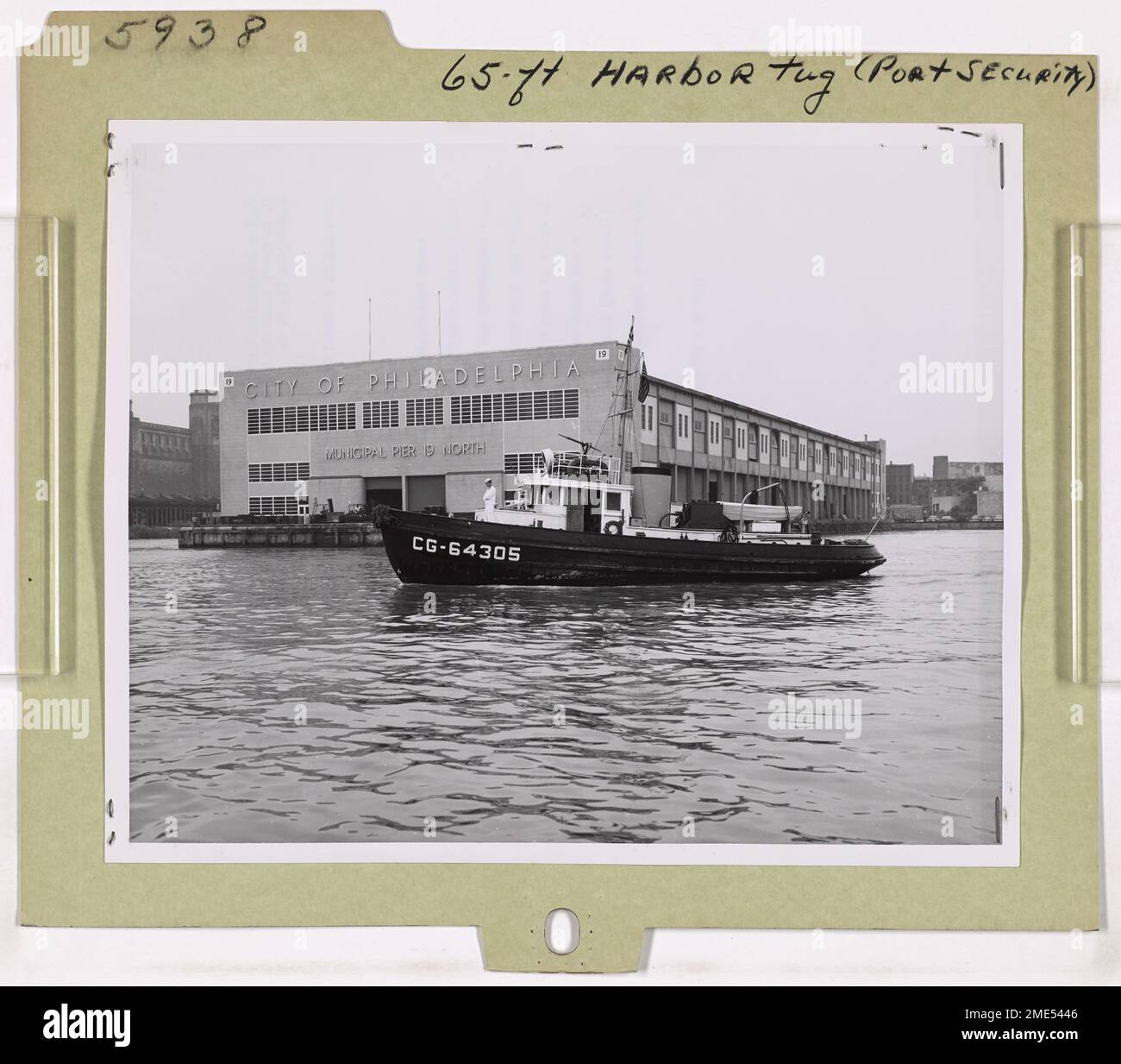 A Coast Guard vessel conducts an inspection of piers at the Port of ...