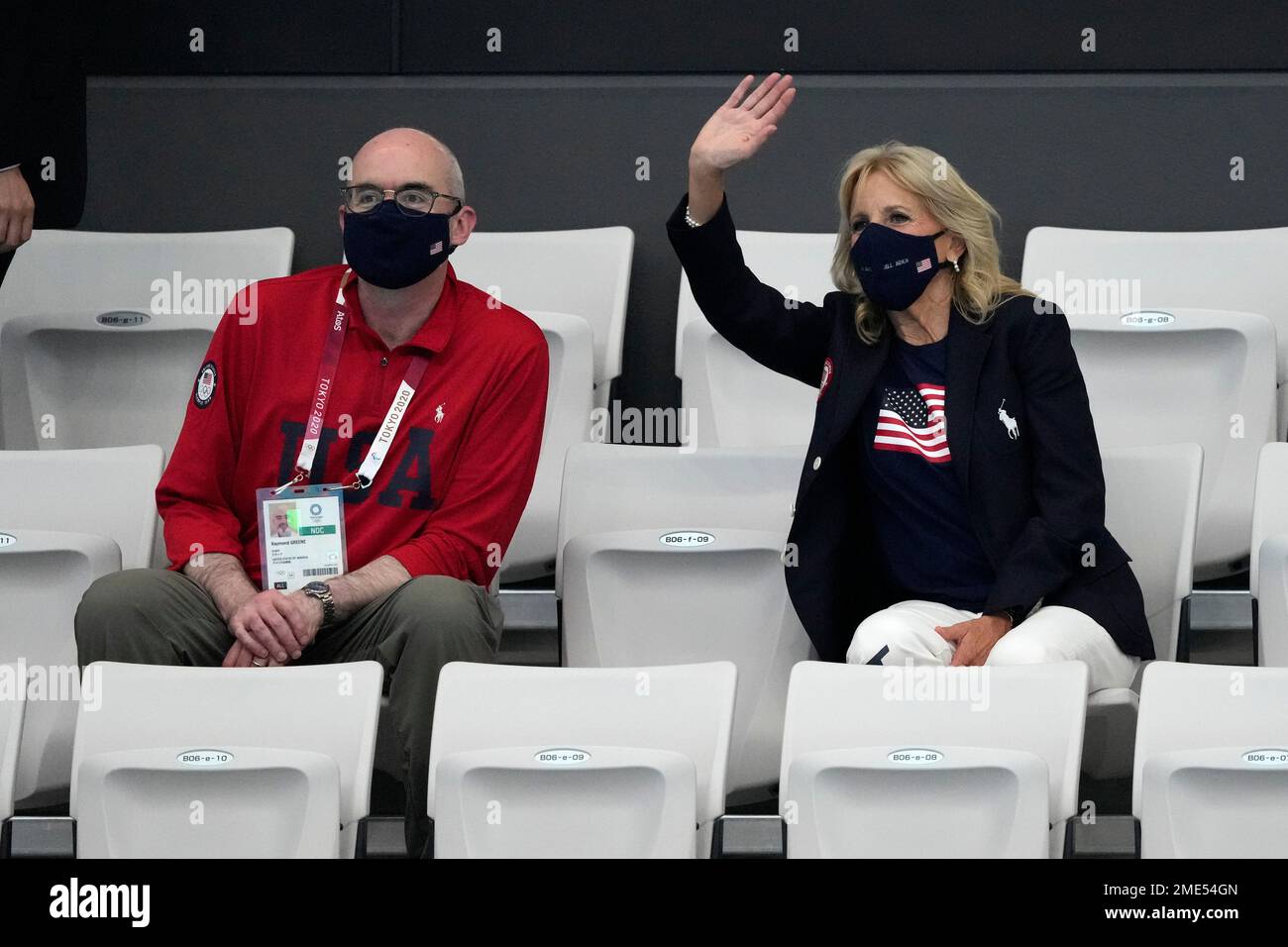 First Lady of the United States Jill Biden, right, waves as she sits ...