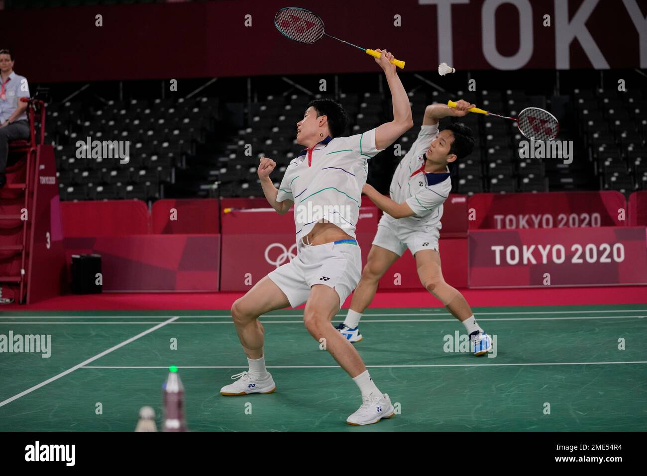 Solgyu Choi and Seungjae Seo, left, of South Korea compete against ...