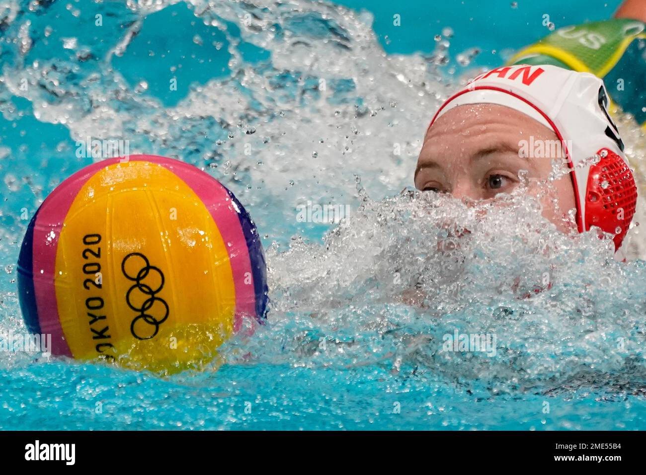 Canada's Hayley McKelvey swims after the ball during a preliminary ...