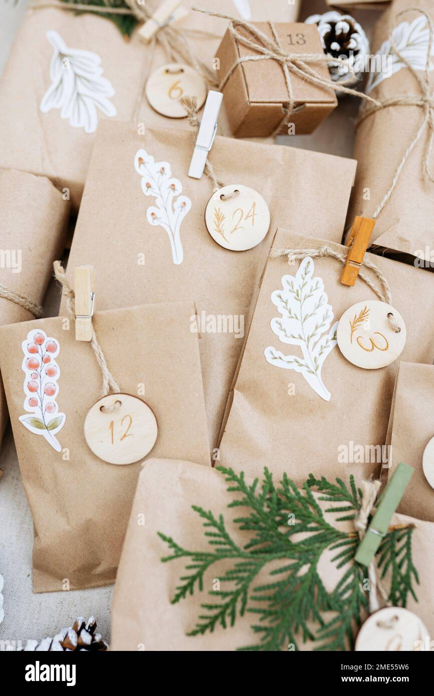 Decorated brown paper bags for advent calendar Stock Photo - Alamy