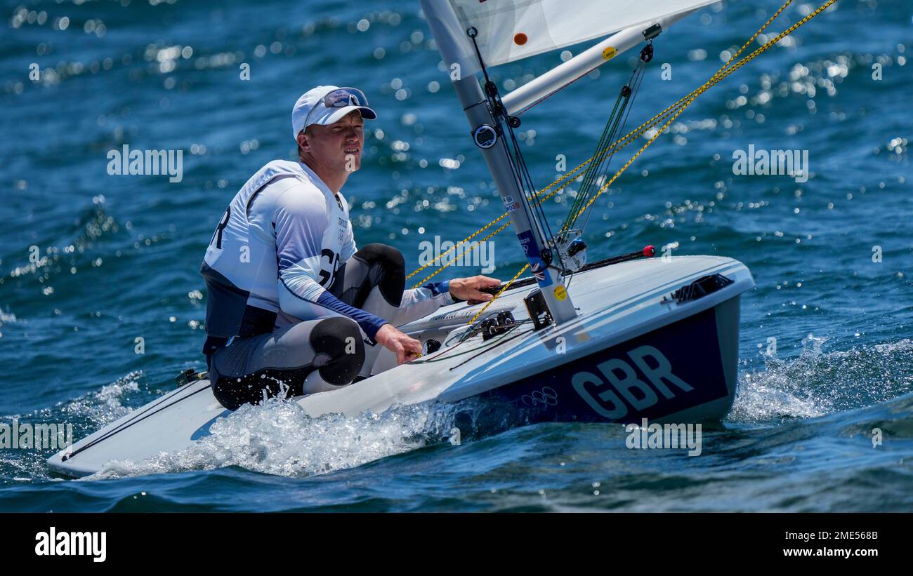Elliot Hanson, from Great Britain, sails during a Laser men training ...