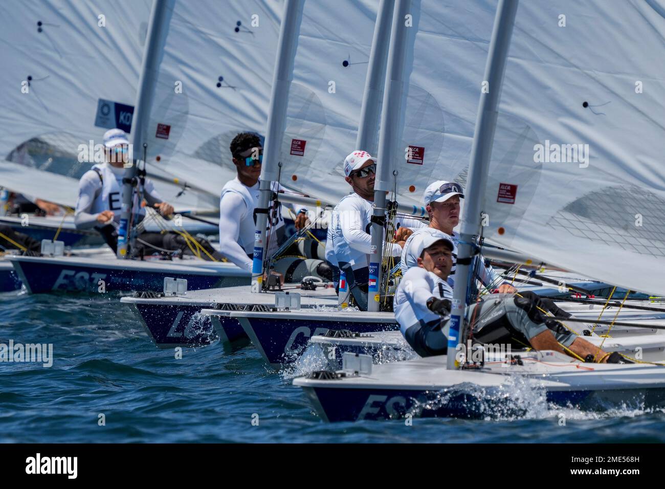 Laser men sailing boats during a training session at the Enoshima ...