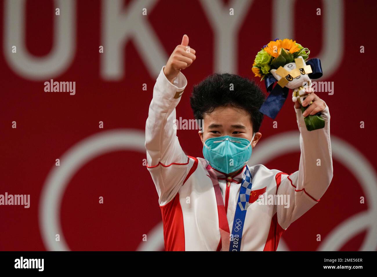 Hou Zhihui of China celebrates on the podium after winning the gold ...