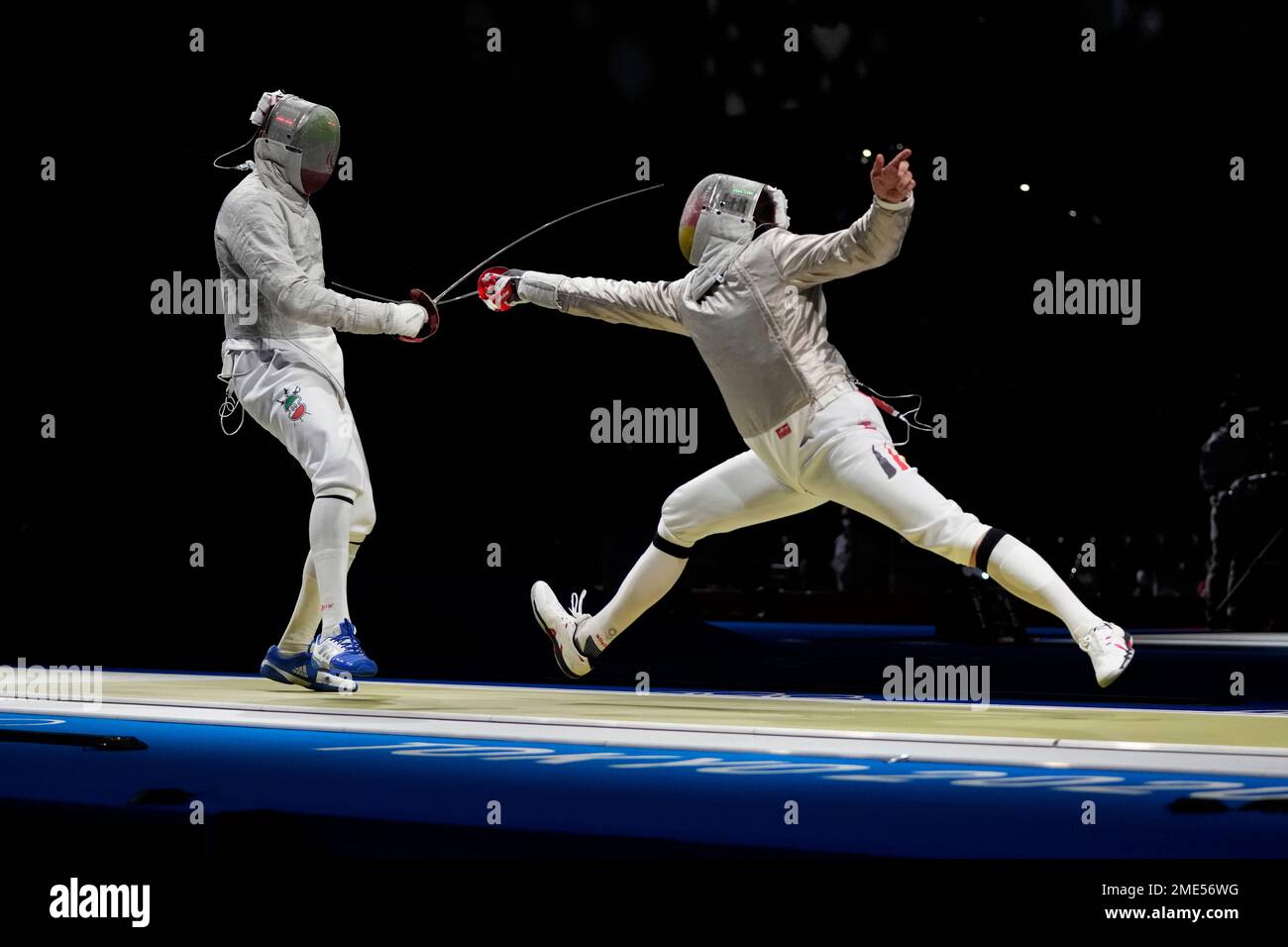 Ali Pakdaman of Iran, left, and Max Hartung of Germany compete in the ...