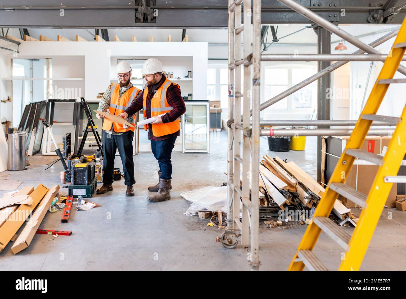 Team engineers having discussion over hi-res stock photography and ...