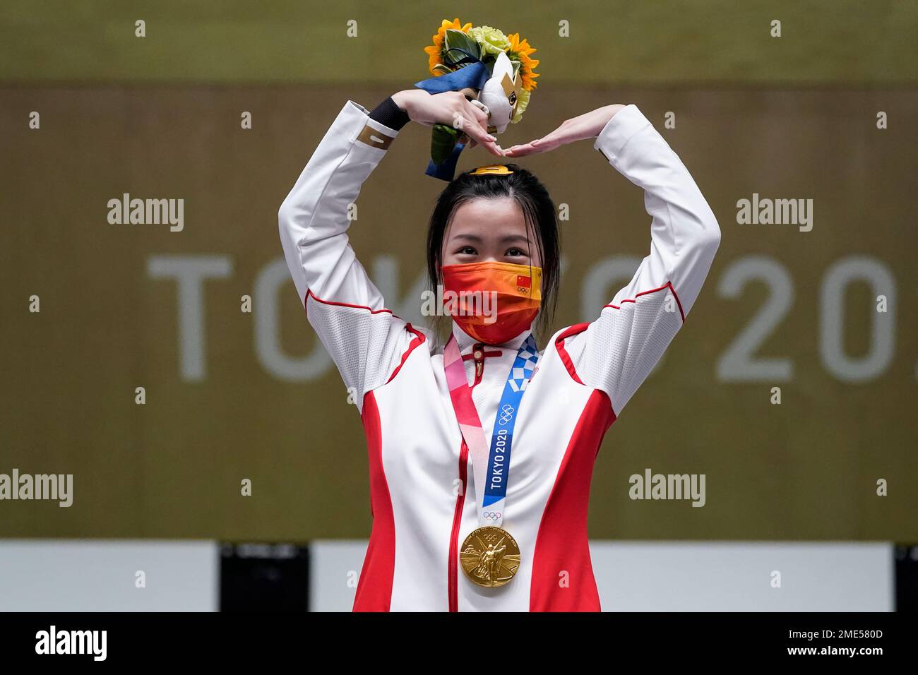 Yang Qian, of China, reacts after winning the gold medal in the women's ...