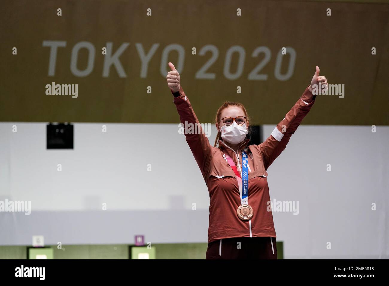 Nina Christen, of Switzerland, celebrates with her bronze medal after ...