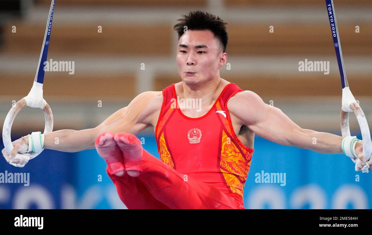 China's Wei Sun competes on the rings during men's artistic gymnastic ...