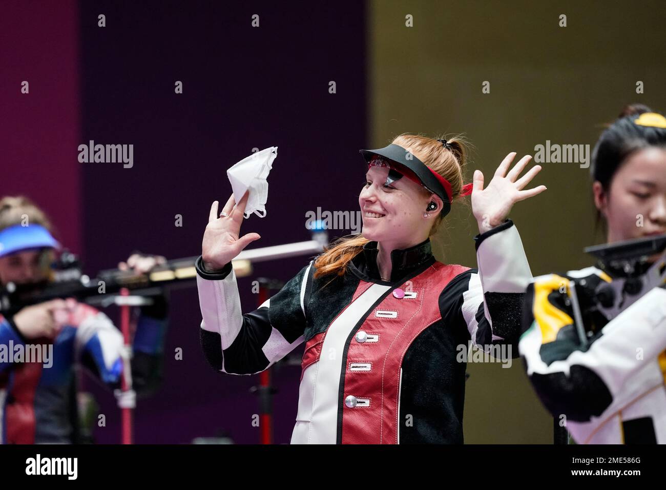 Nina Christen, of Switzerland, reacts after winning the bronze medal in ...