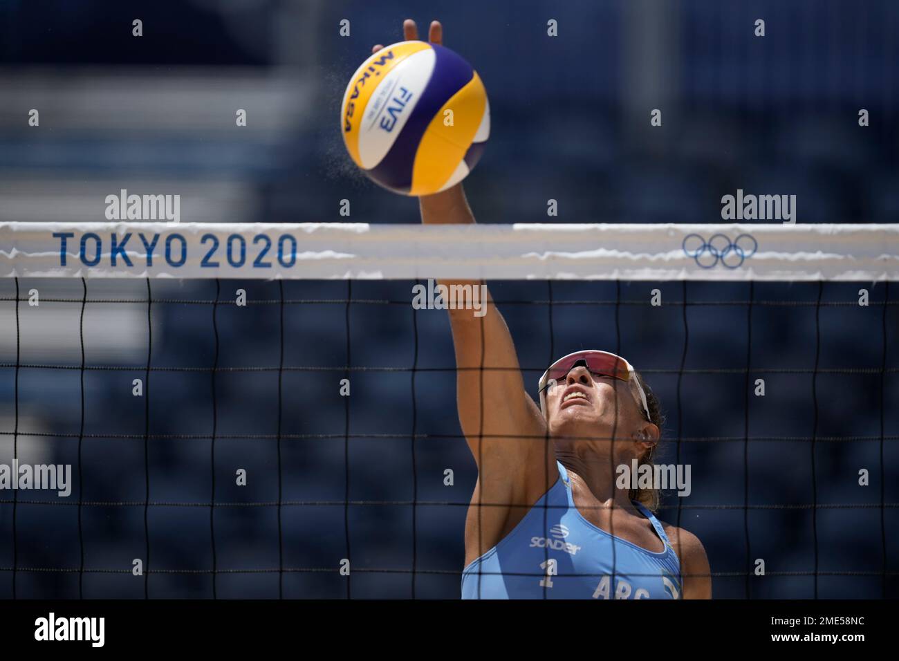 Ana Gallay, of Argentina, hits the ball during a women's beach ...