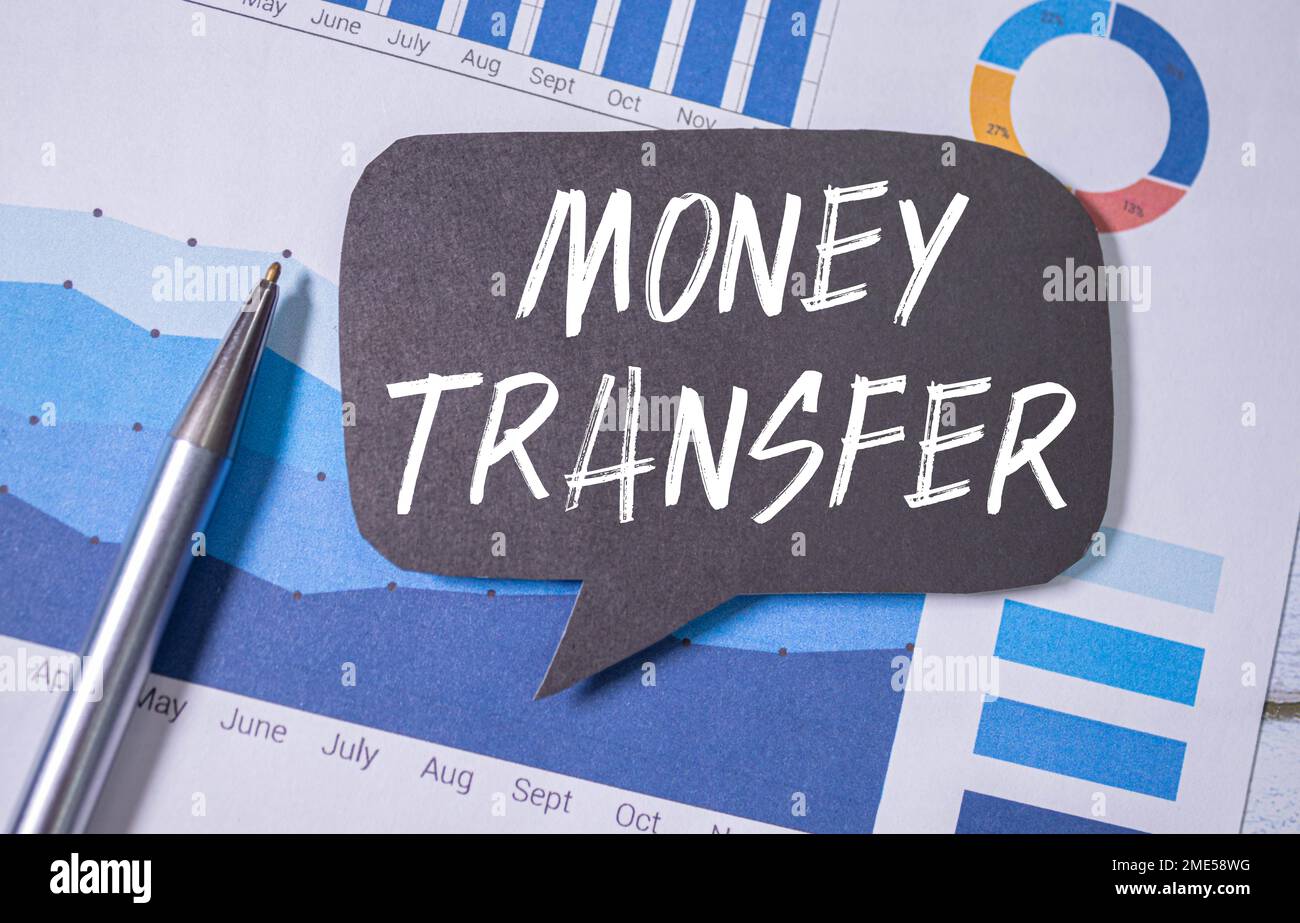MONEY TRANSFER text on a paper on chart background Stock Photo - Alamy