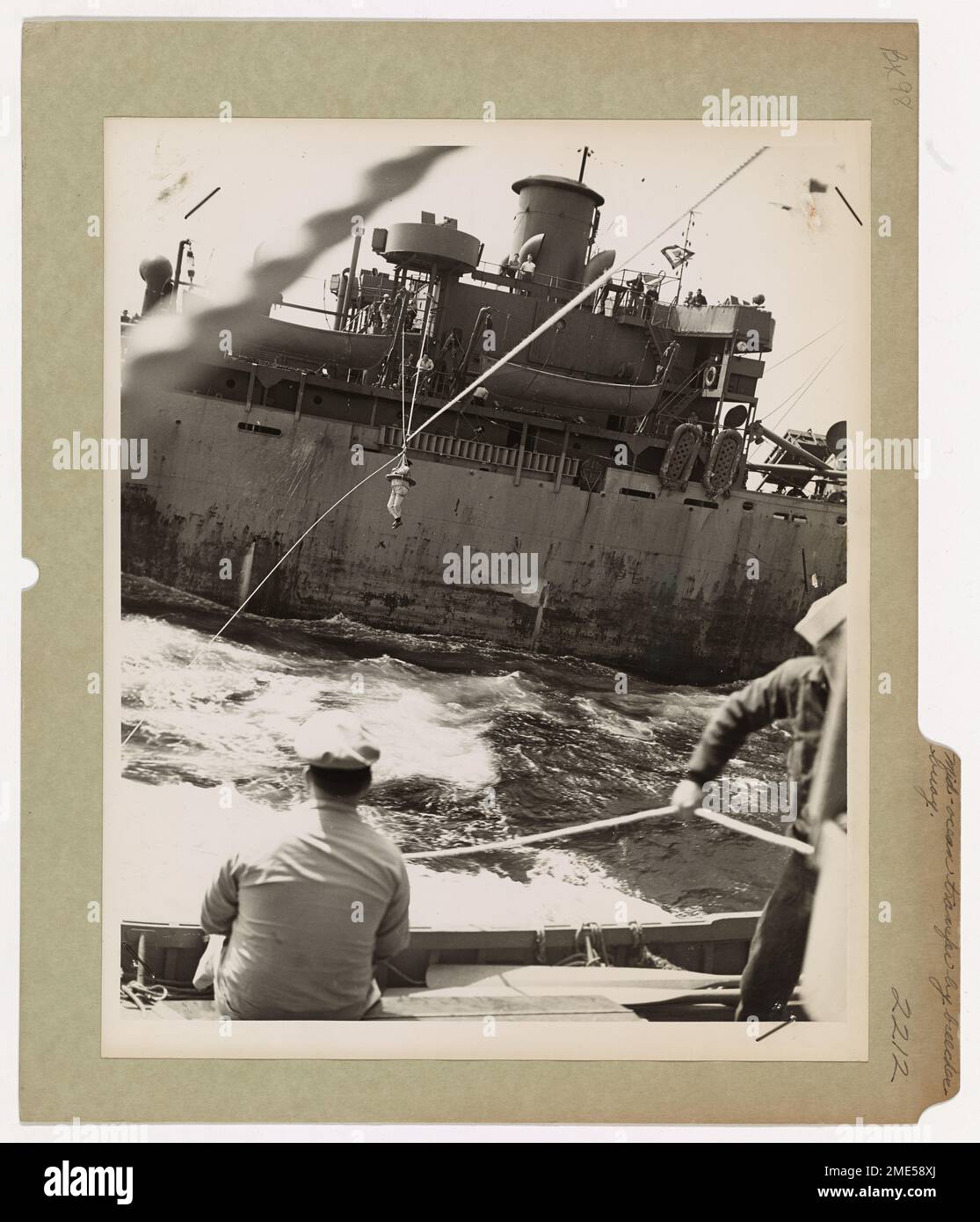 This image shows the transfer of an ailing merchant seaman from his ...