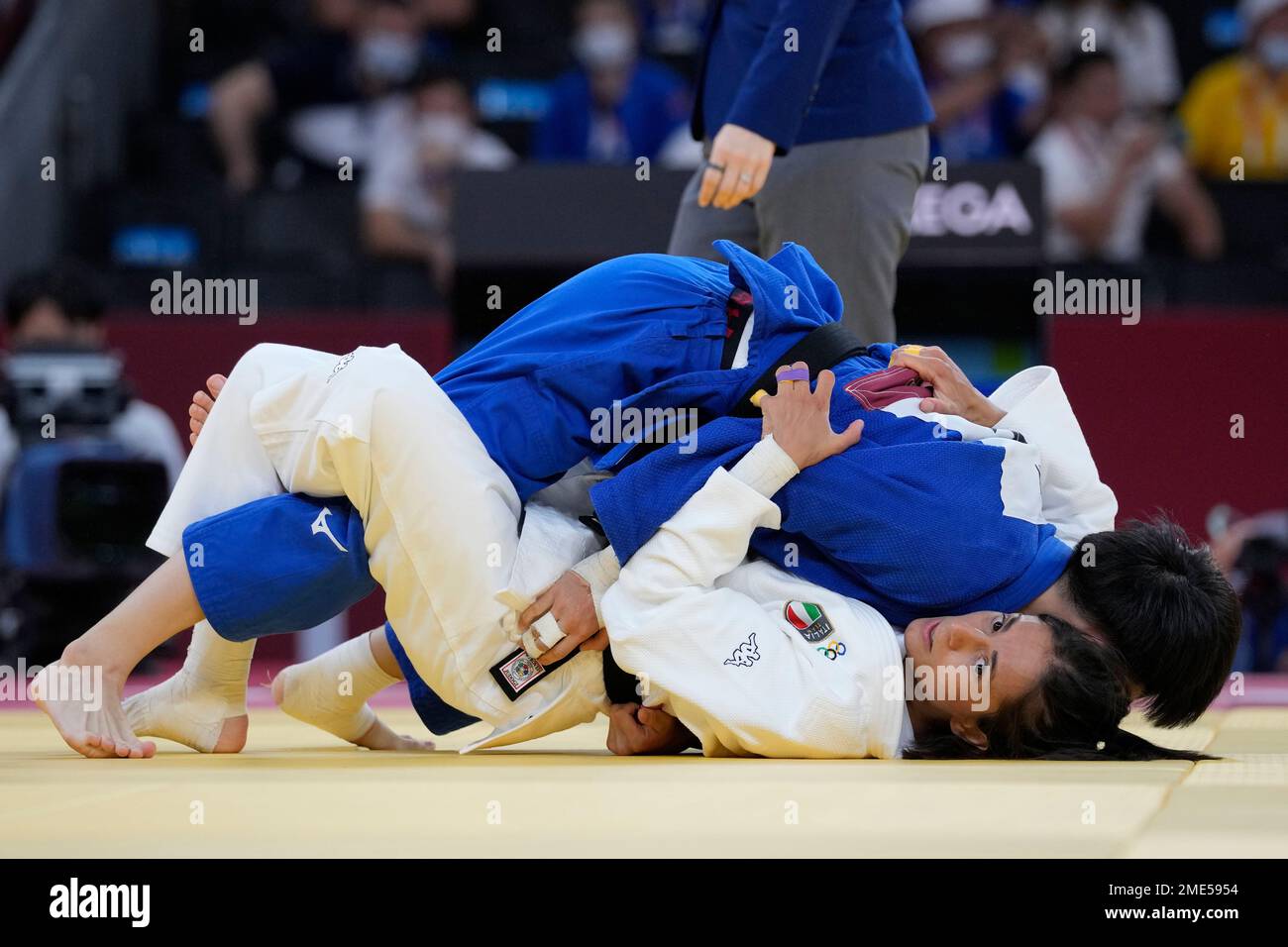 Francesca Milani of Italy, bottom and Lin Chen-hao of Taiwan compete ...