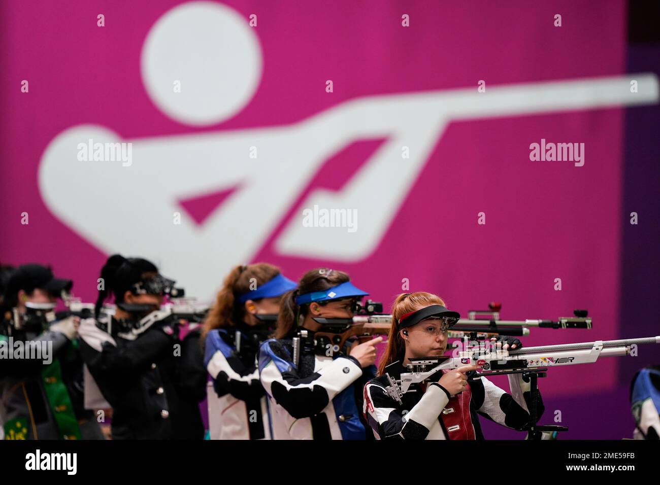 Nina Christen, right, of Switzerland, competes in the women's 10-meter ...