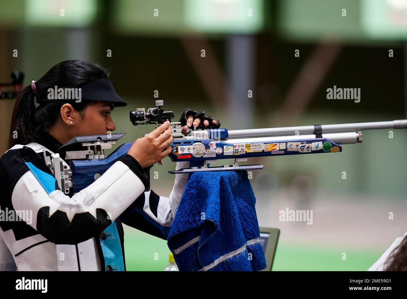 Apurvi Chandela, of India, competes in the women's 10-meter air rifle ...