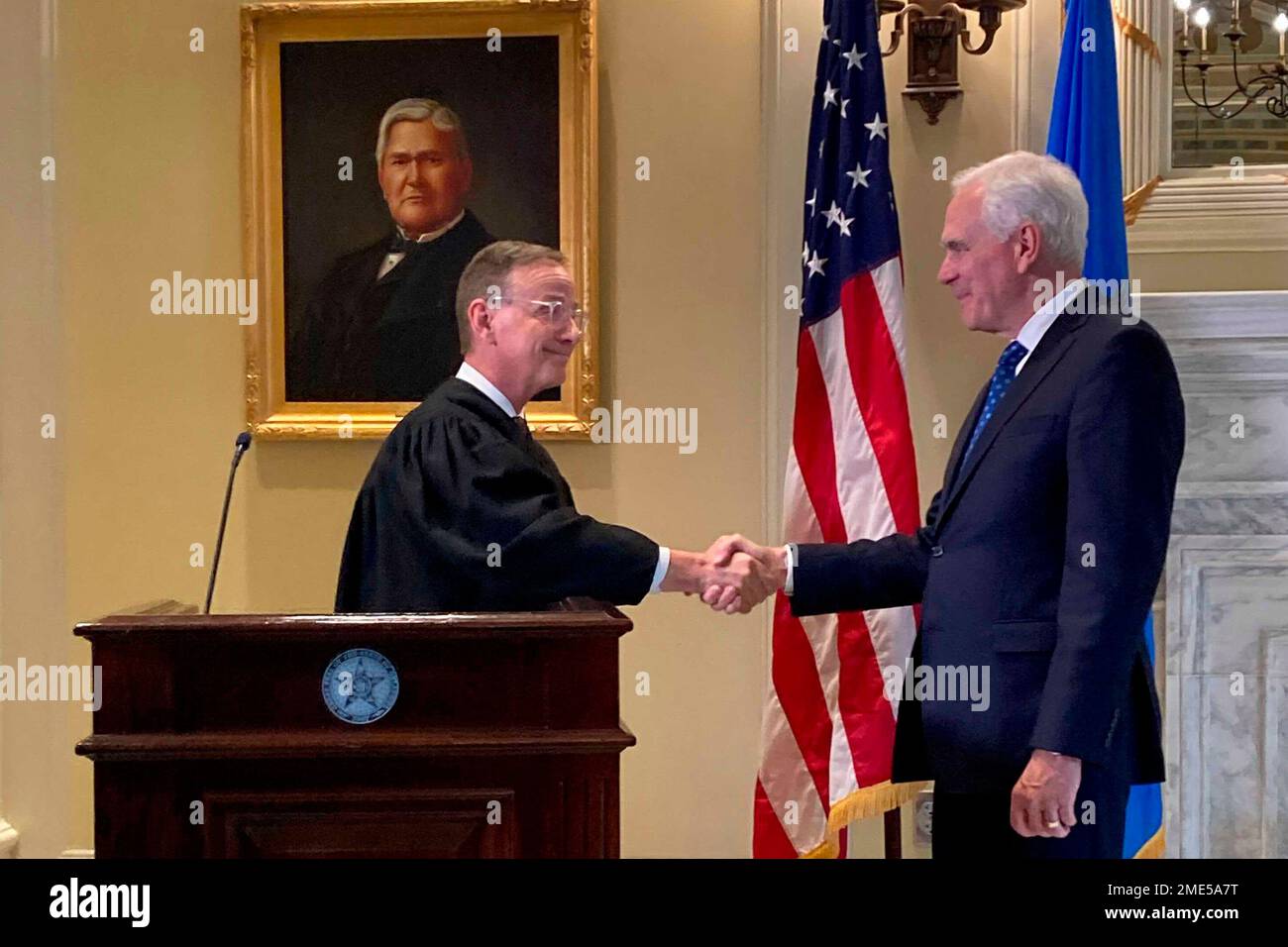 Oklahoma Supreme Court Justice John Kane, left, shakes hands with ...