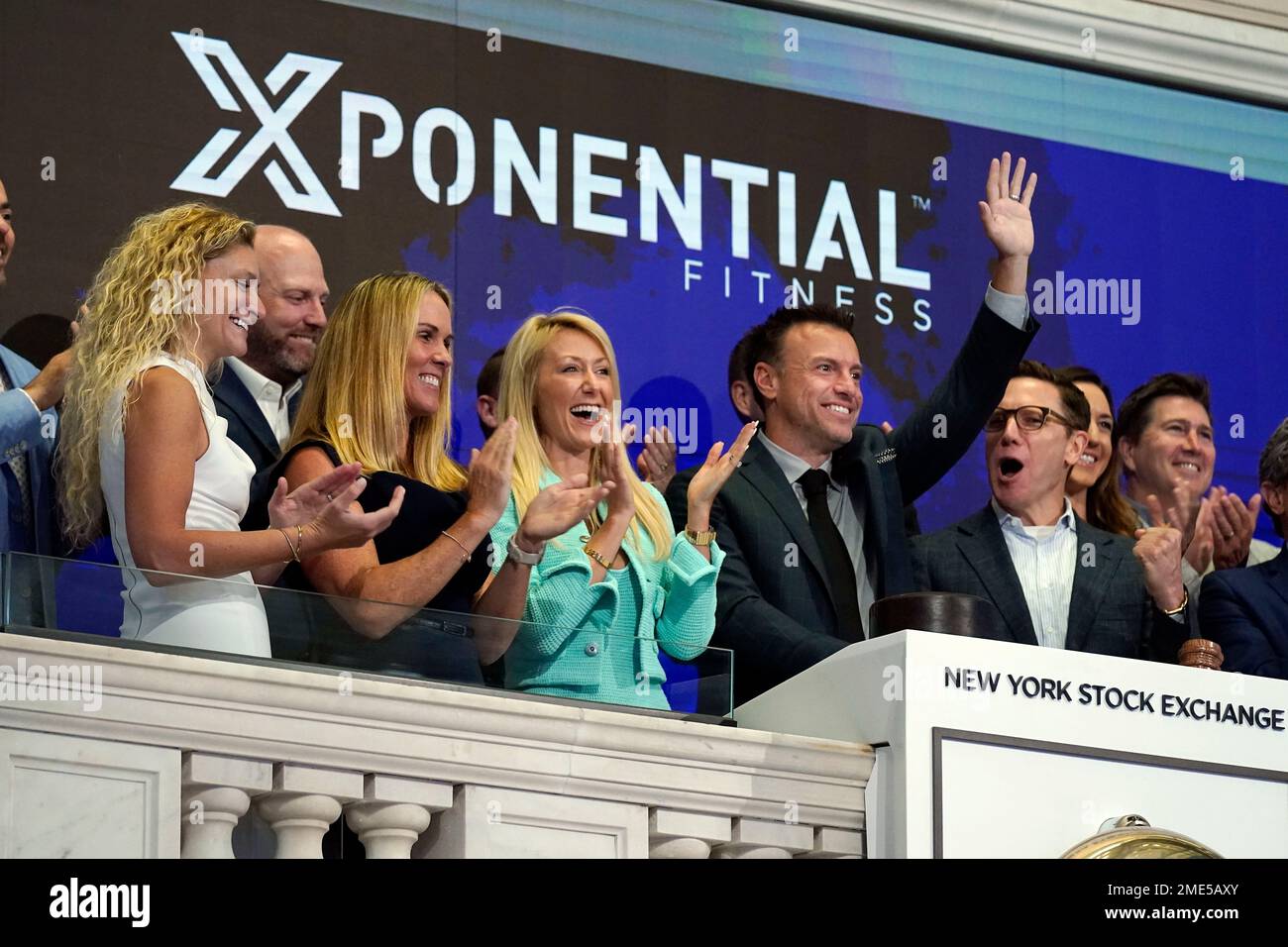 Xponential Fitness CEO & founder Anthony Geisler raises his arm as he ...