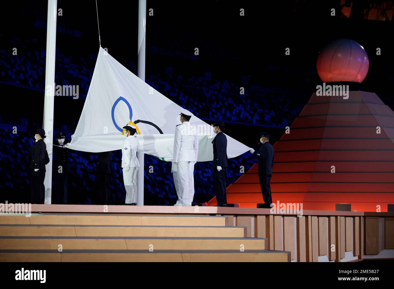 The Olympic flag is raised during the opening ceremony in the Olympic ...