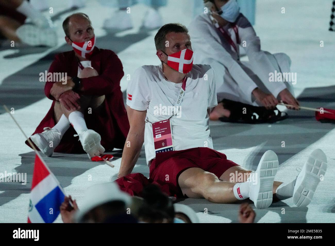 CORRECT NATIONALITY Athletes from Denmark listen to speeches during the ...