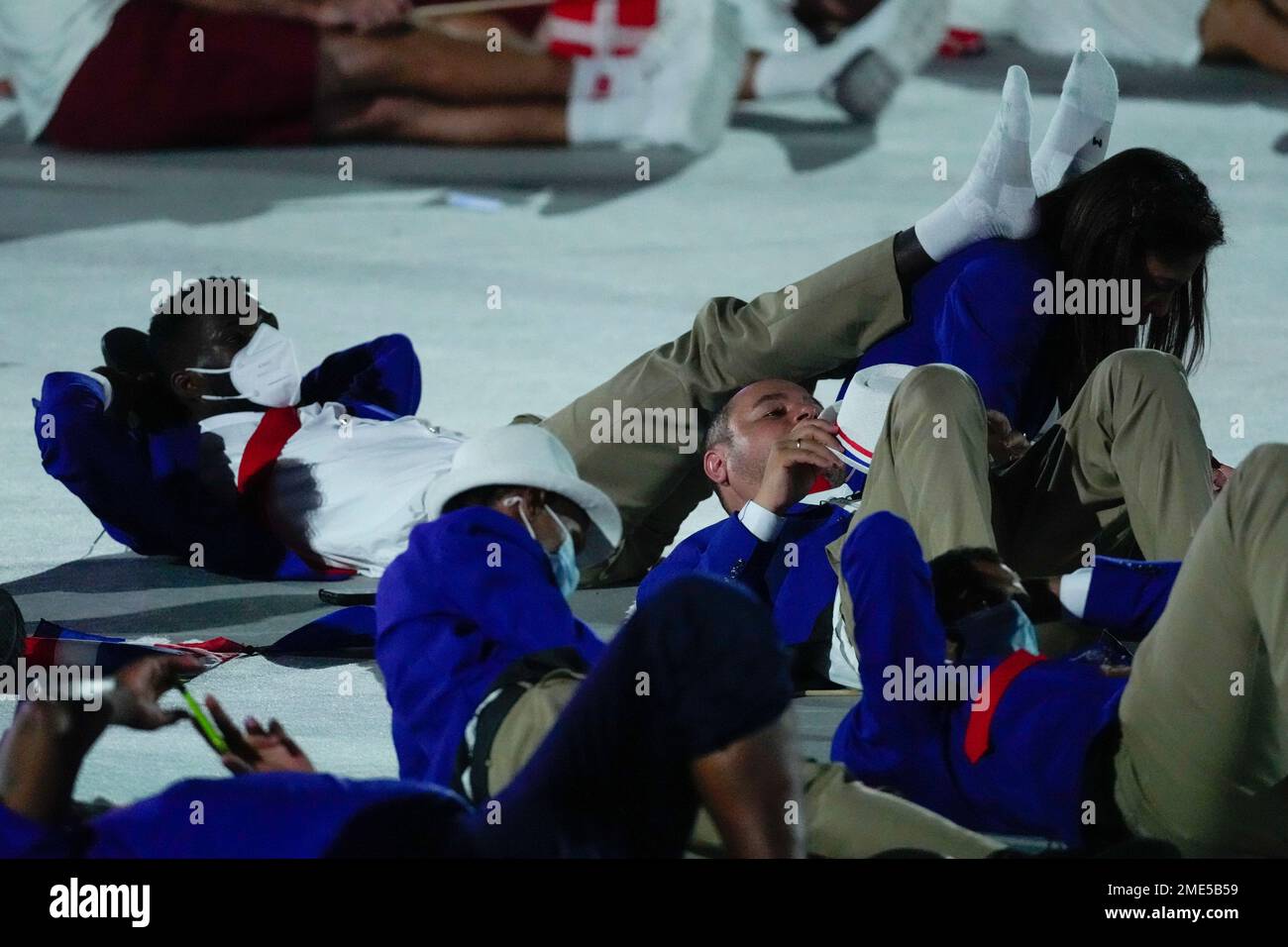 Athletes listen to the official speeches during the opening ceremony in ...
