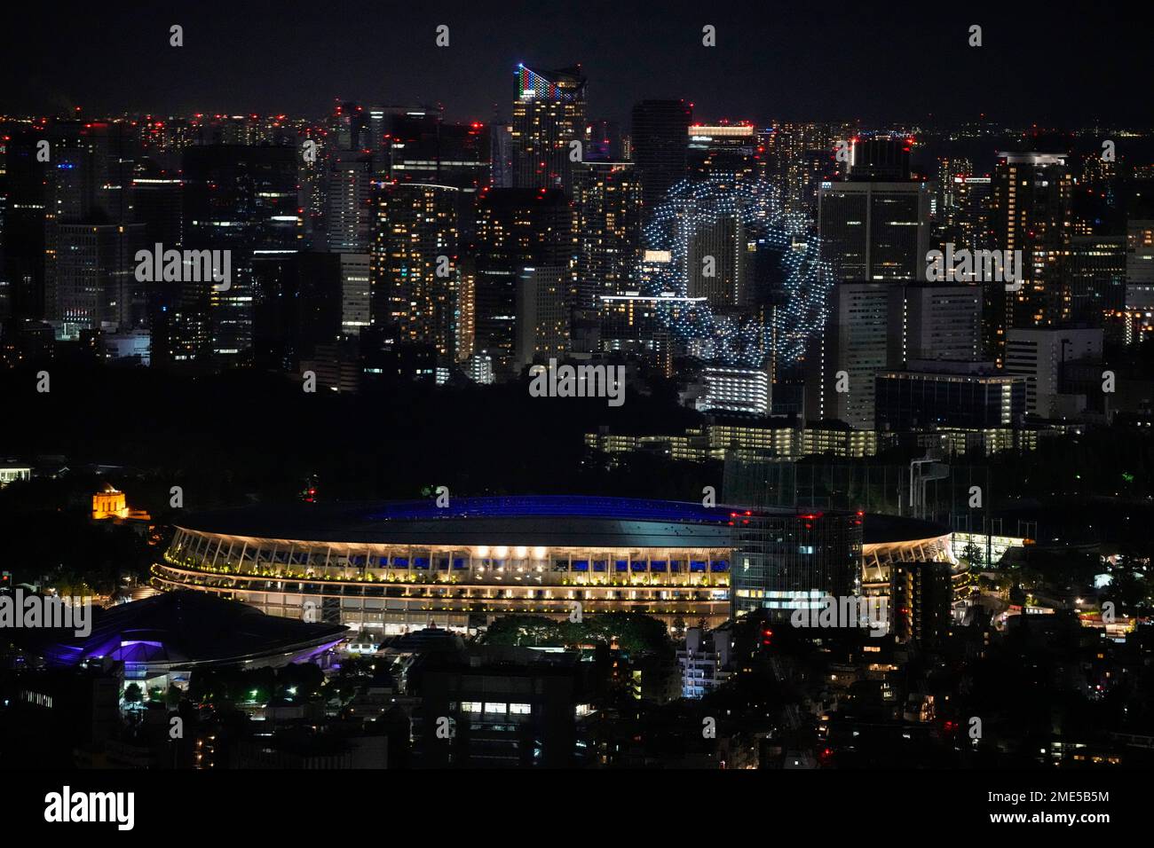 More than 1,800 drones form the shape of the Tokyo 2020 logo during the ...