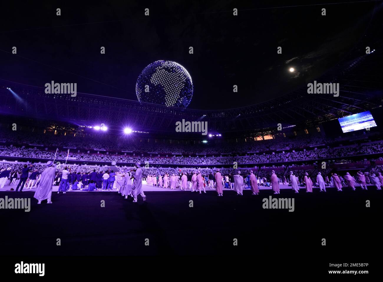 Drones perform above the stadium during the opening ceremony in the ...