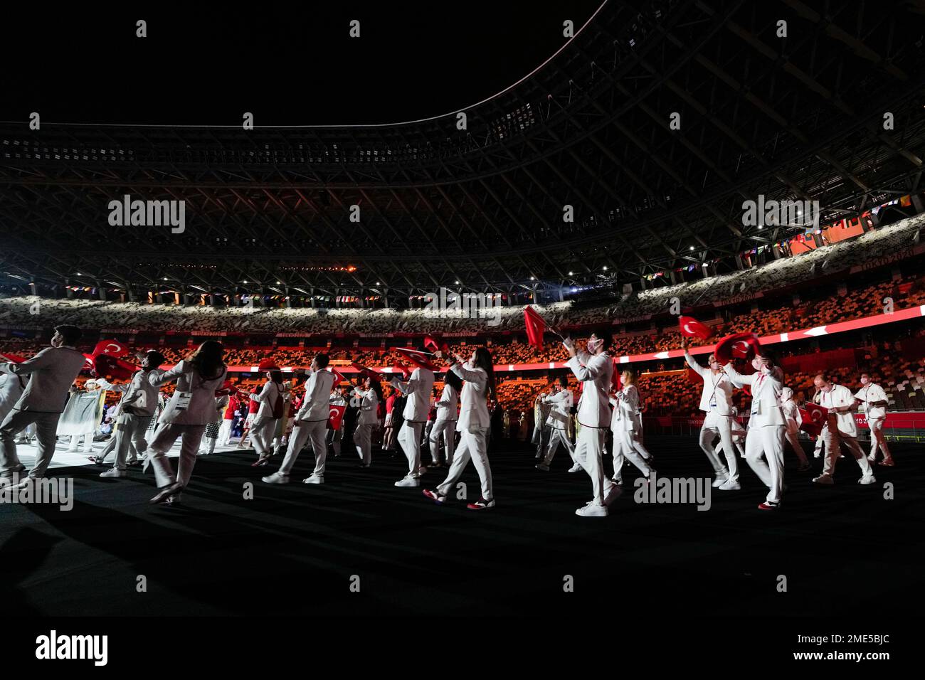 Turkish athletes march into the stadium during the opening ceremony in ...
