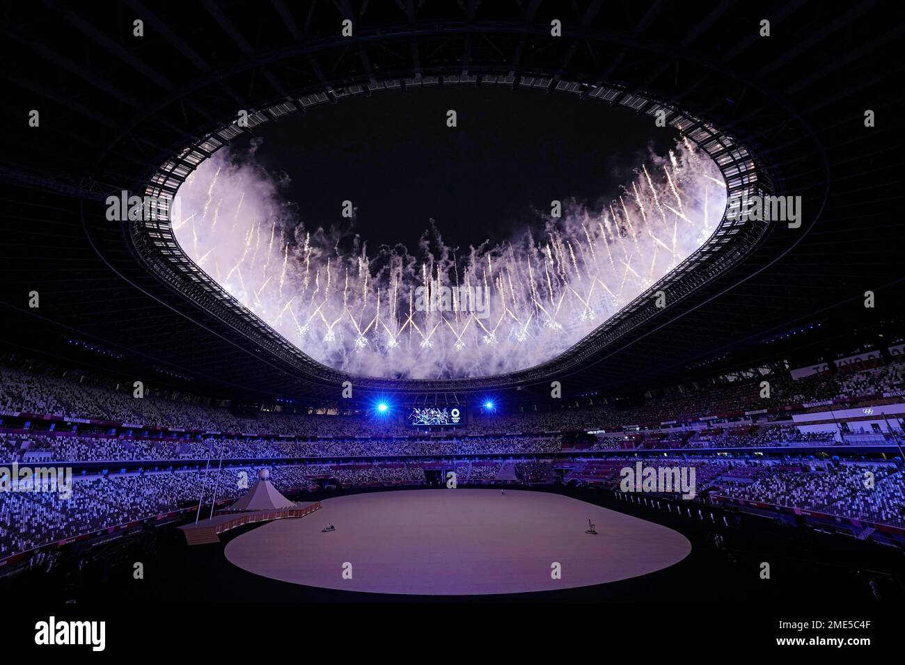 Fireworks explode during the opening ceremony in the Olympic Stadium at ...